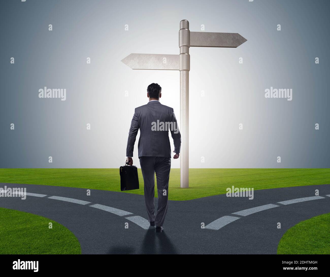 The businessman in difficult choice concept Stock Photo - Alamy