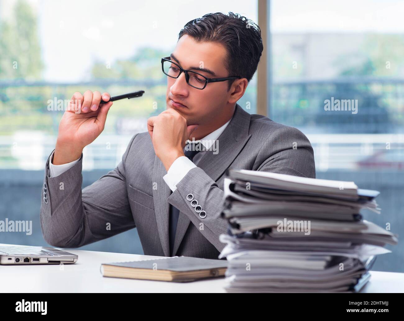 The businessman working in the office Stock Photo - Alamy