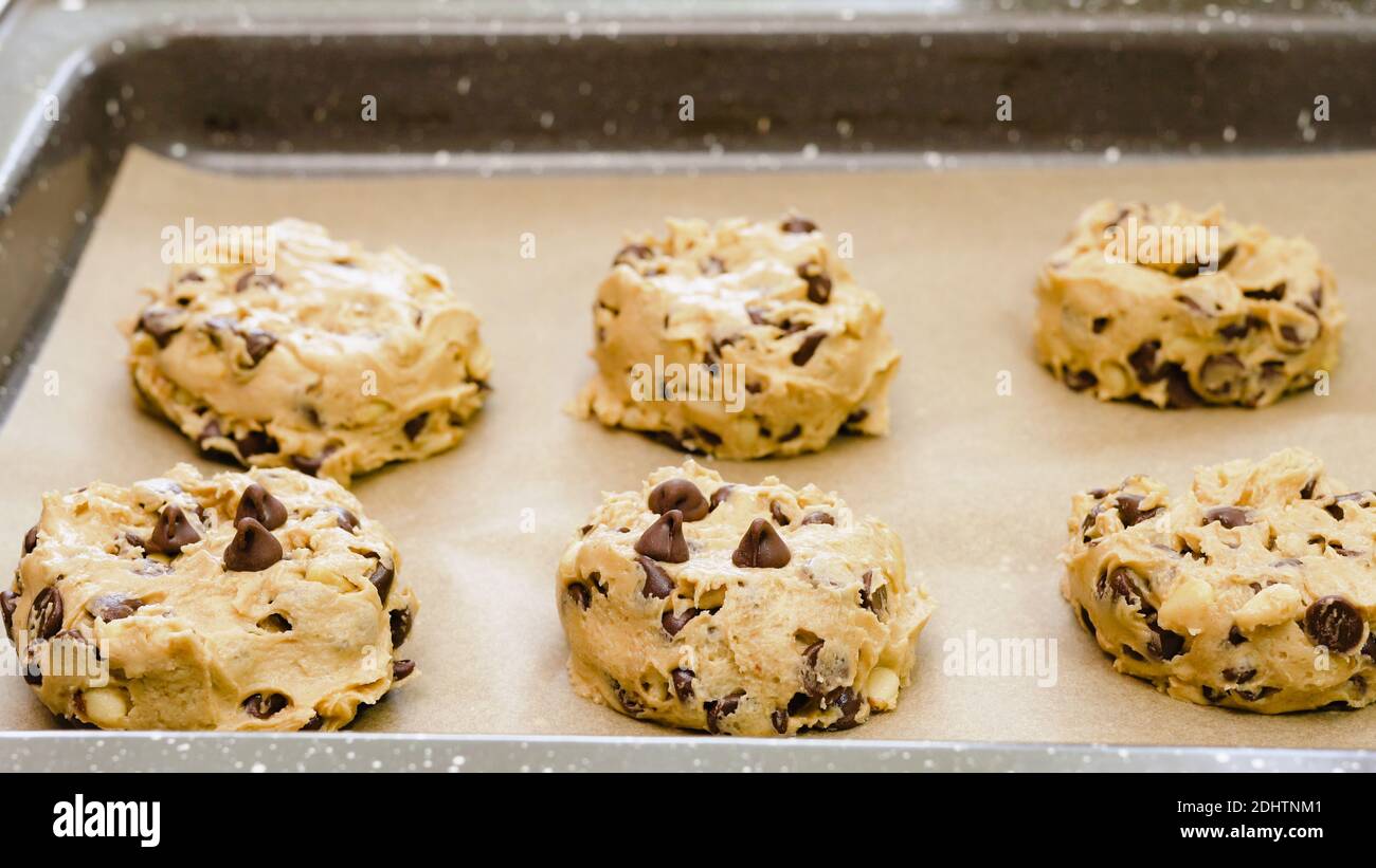 Chocolate Chip Cookies recipe. Unbaked Cookies close up on a baking ...