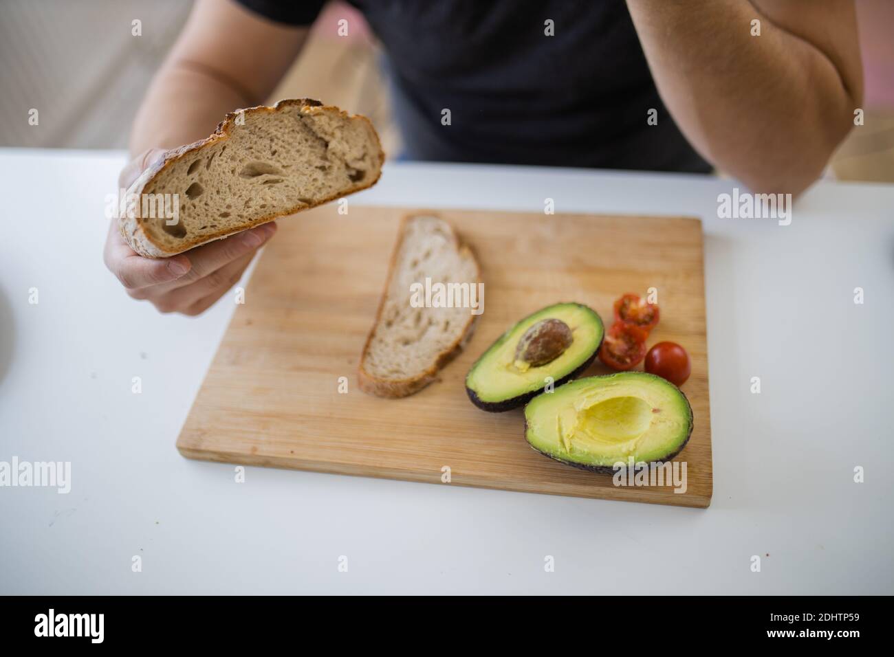 Hand knife sliced bread hi-res stock photography and images - Alamy