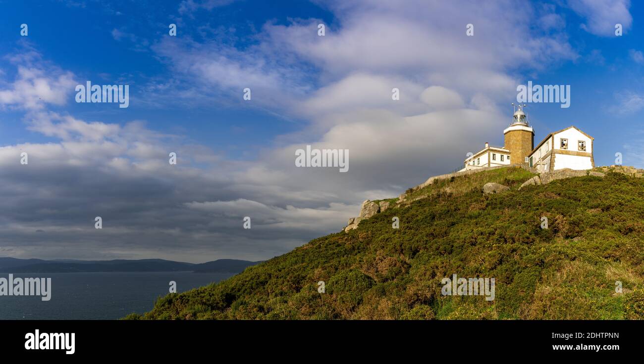 the Cape Finisterre Lighthouse in warm morning light Stock Photo - Alamy