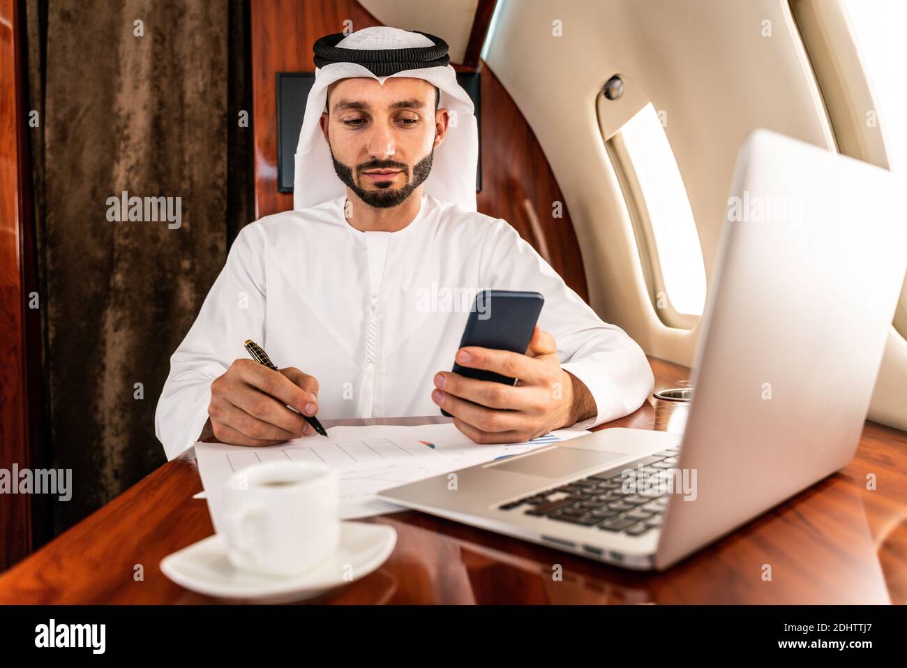 Arabic man wearing kandora in emirates style flying on exclusive ...