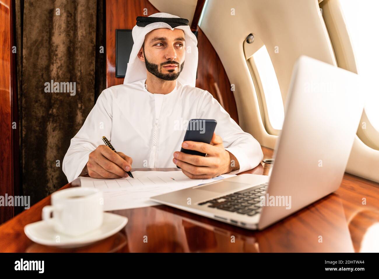 Arabic man wearing kandora in emirates style flying on exclusive ...