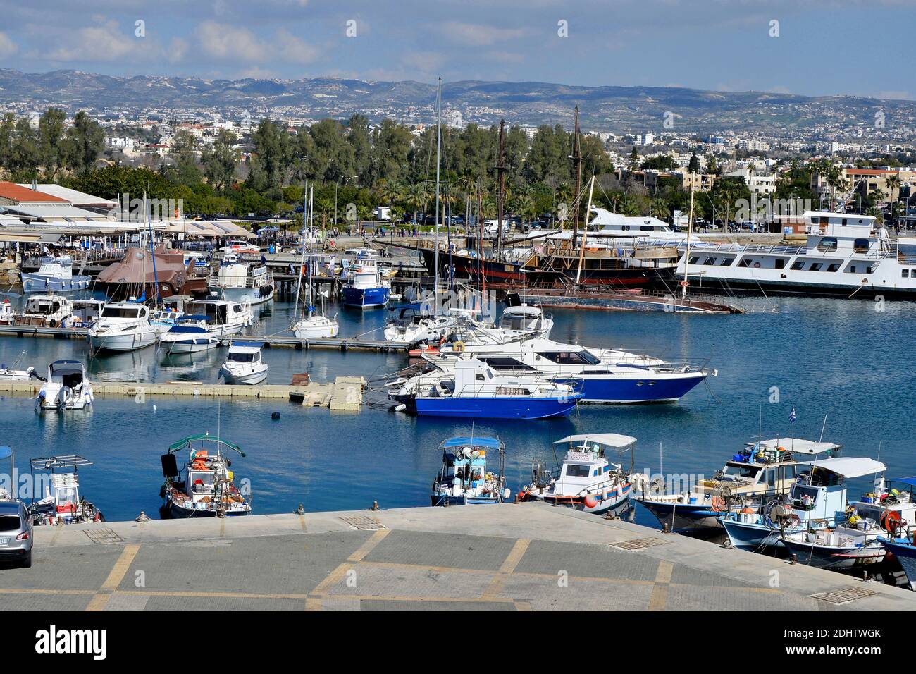 PAPHOS, SOUTHERN CYPRUS, JULY the harbor on a busy summer day with many ...