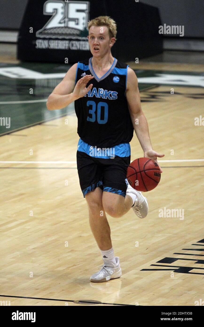 December 11, 2020 - Hawaii Pacific Sharks guard Jacob Foy #30 brings ...