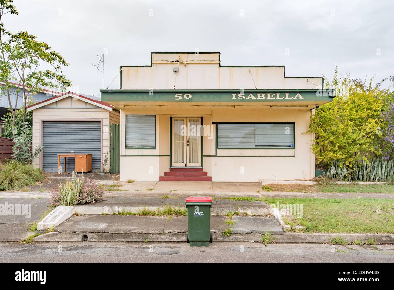 A former, early 20th century, isolated suburban shop or store, complete ...