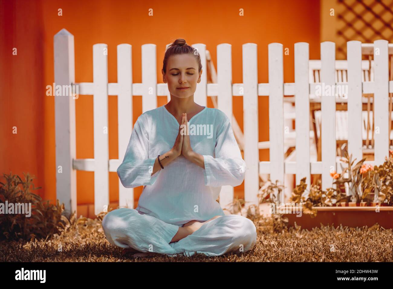 Beautiful Peaceful Female Doing Yoga Exercises in Morning Backyard ...