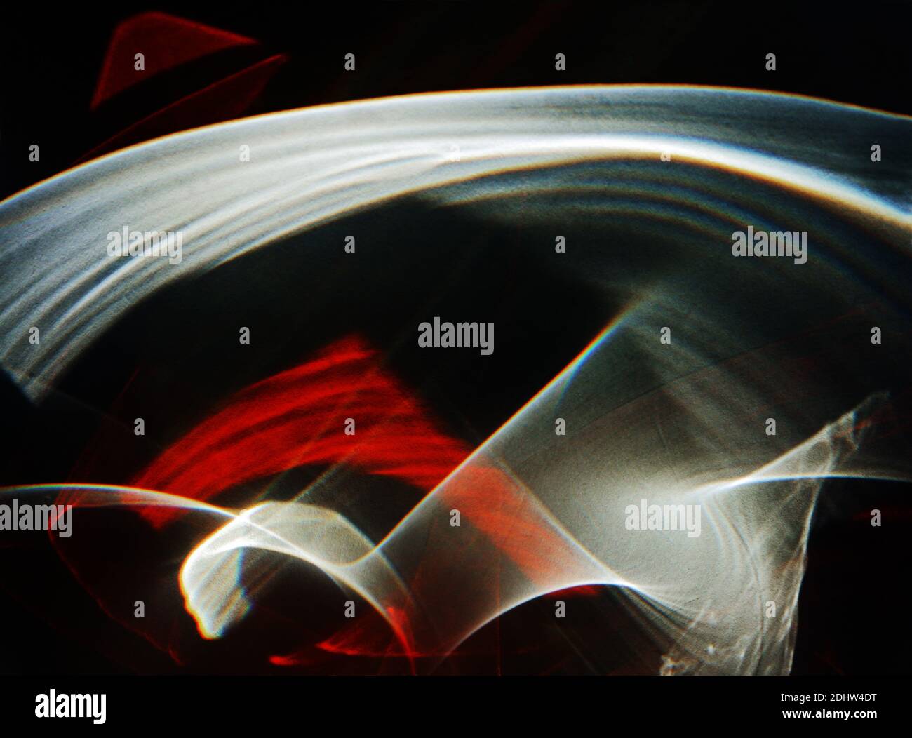 Decorative picture for interior. Reflection of red optical glass in the ...