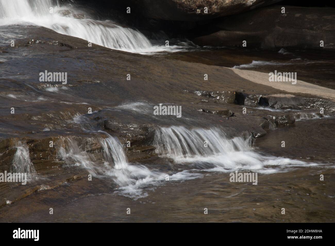 Shallow water flowing over stony hi-res stock photography and images ...
