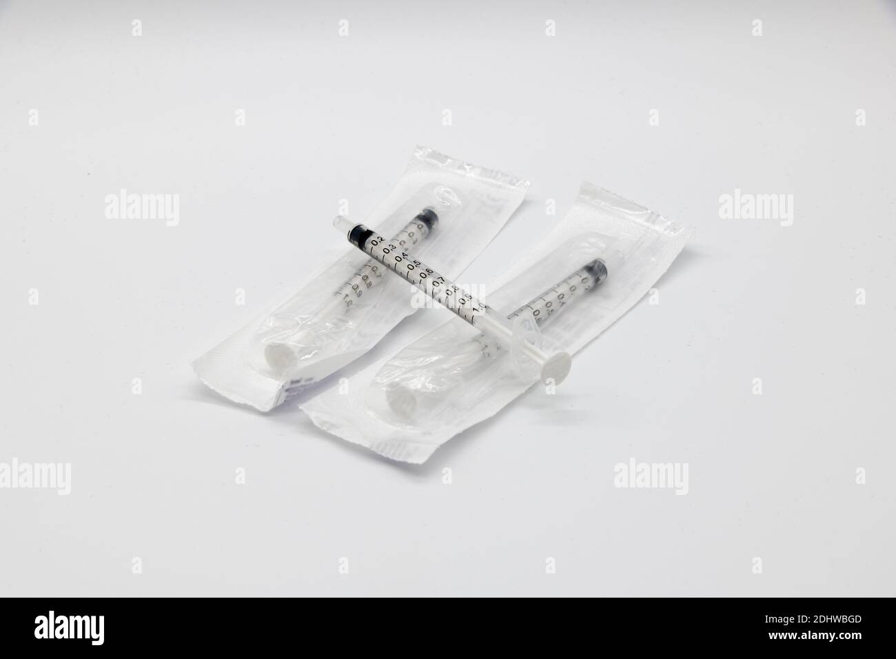 Syringes three syringes in packets hi-res stock photography and images ...