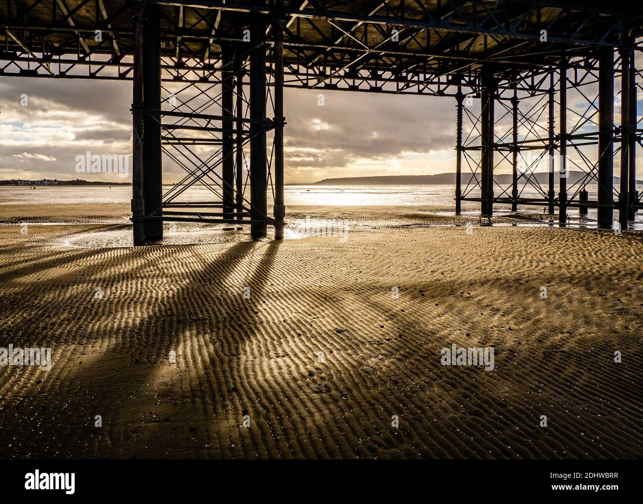 Underneath the Grand Pier at Weston super Mare looking towards Brean ...