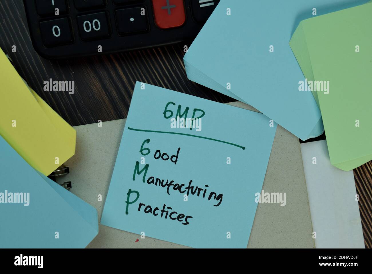GMP - Good Manufacturing Practices write on sticky notes isolated on ...