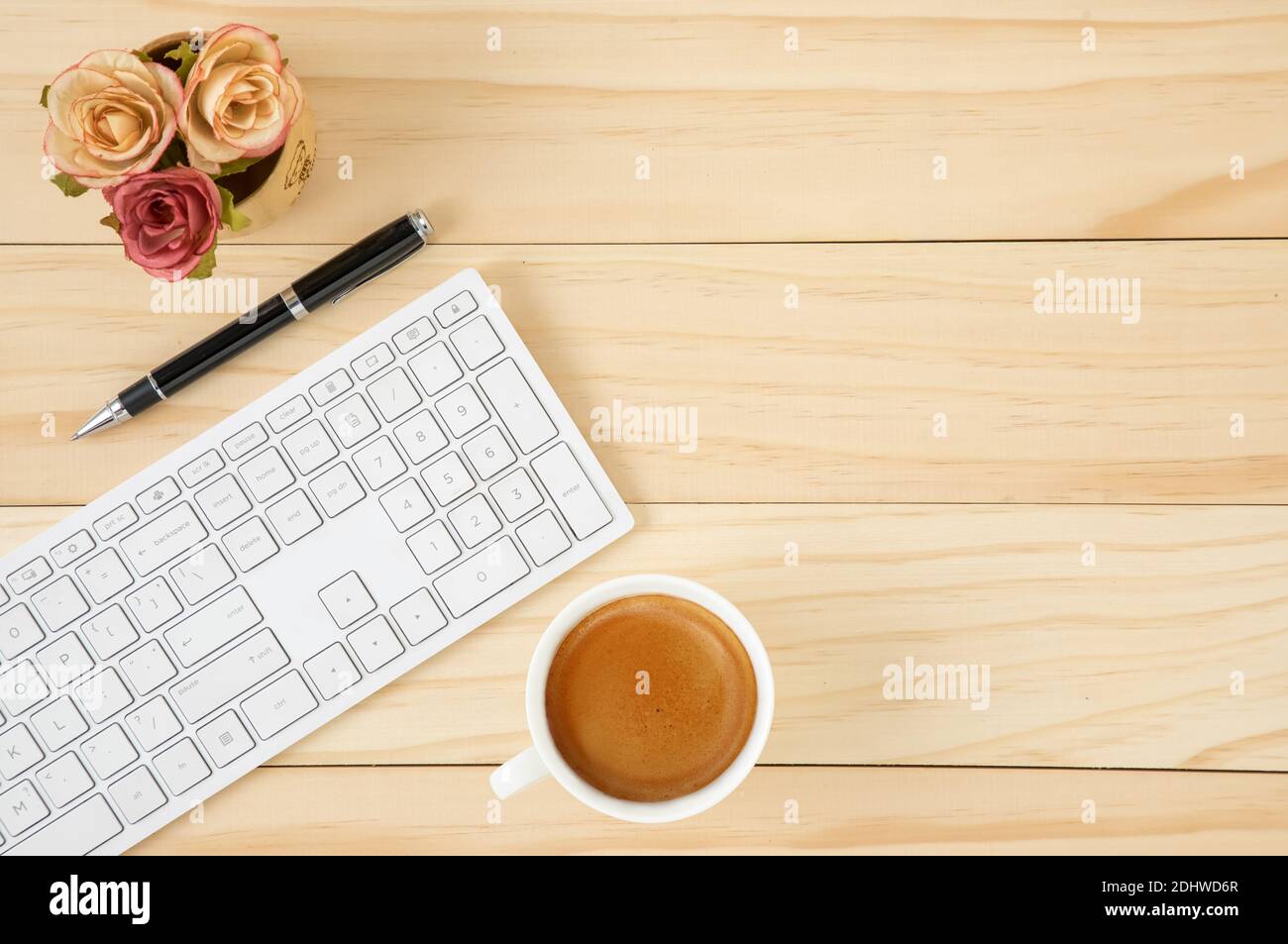 A Minimal Business Workspace With White Wireless Computer Mouse And