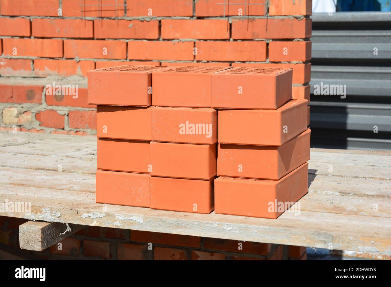 Close up on Bricklaying House Construction Site. How To Lay Bricks Like ...