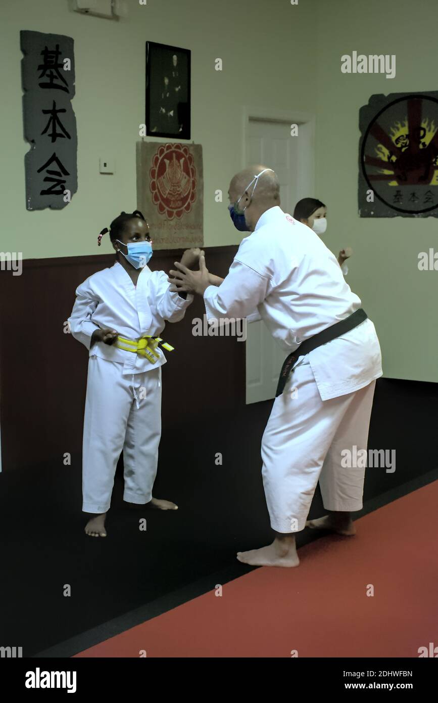 This action photo is of my daughter and her classmates in a Karate ...