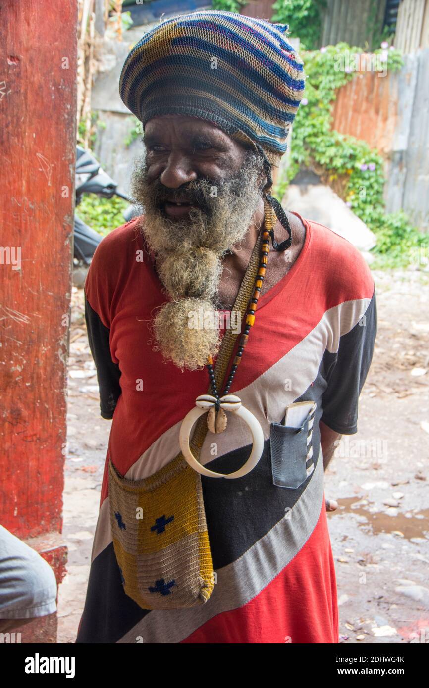 Old man (Dani?) with bundled beard and hair in Wamena, Papua, Indonesia ...