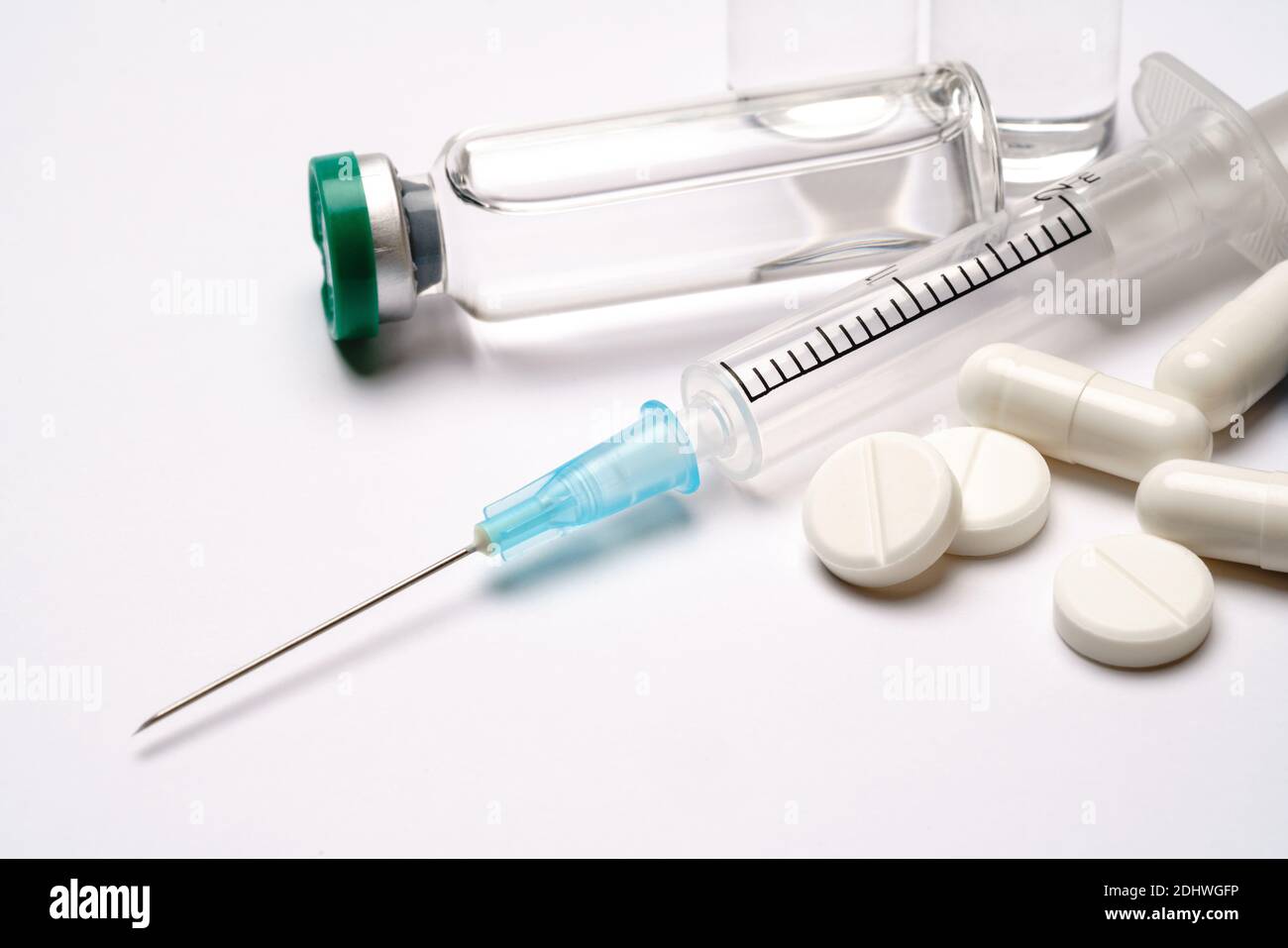 medical ampoule vials, tablets, capsules and syringe isolated on white ...