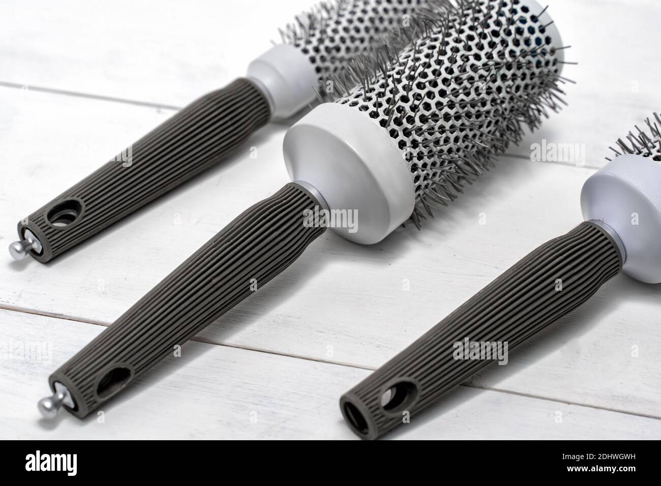 set of professional round hair styling combs Stock Photo - Alamy
