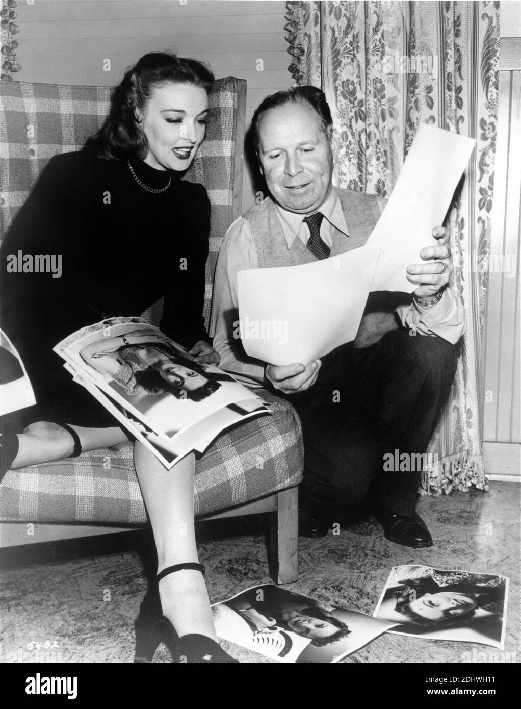 KARIN BOOTH looks at Portraits of herself with Still Photographer ...