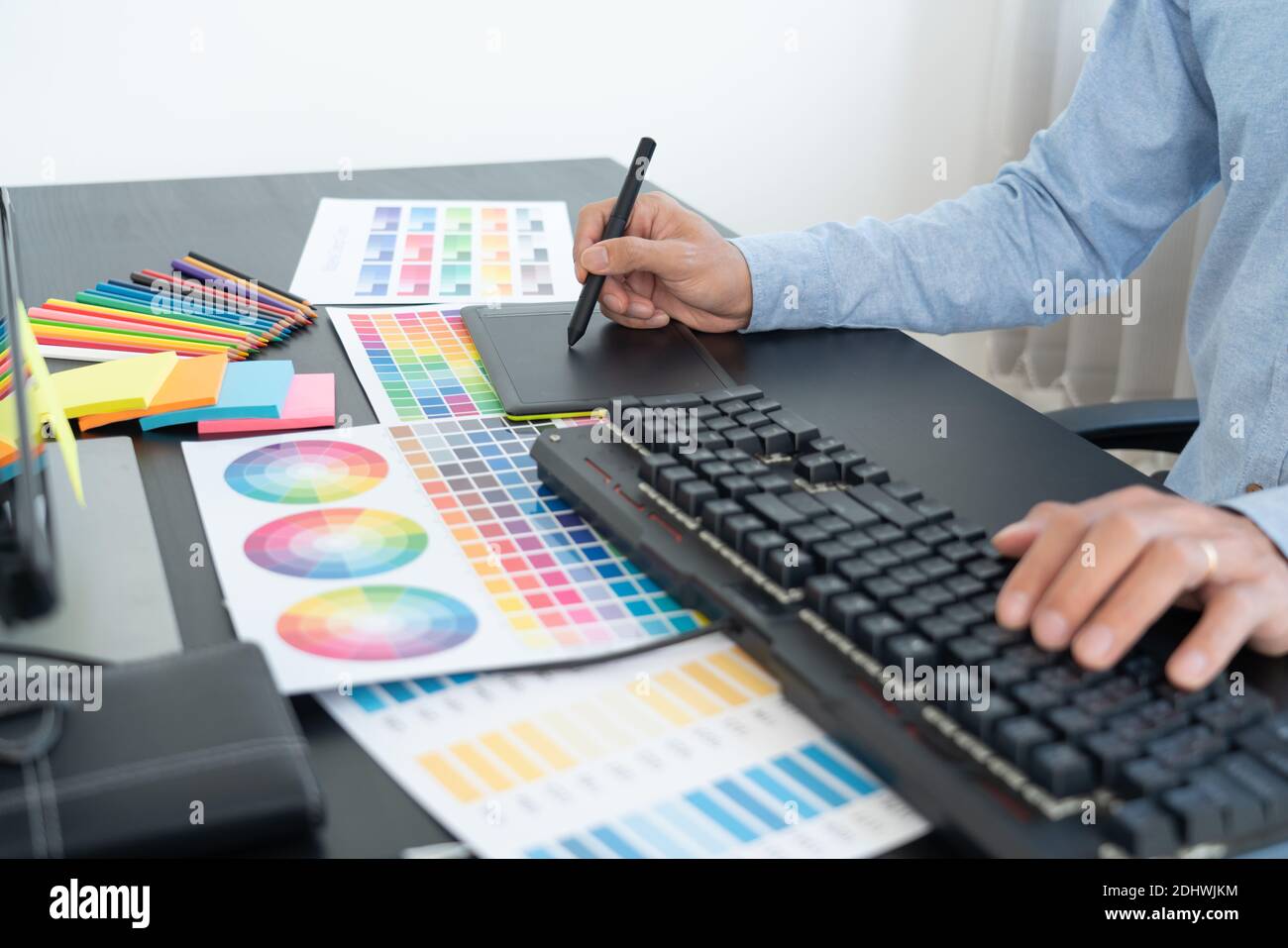 interior designer or creative graphic designer working on project ...