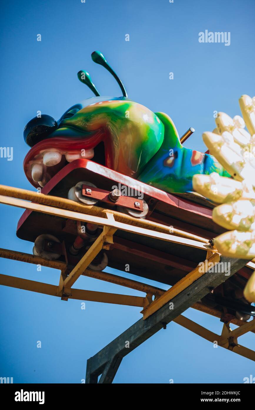 Shot of the colorful roller coaster ride at an amusement park Stock ...