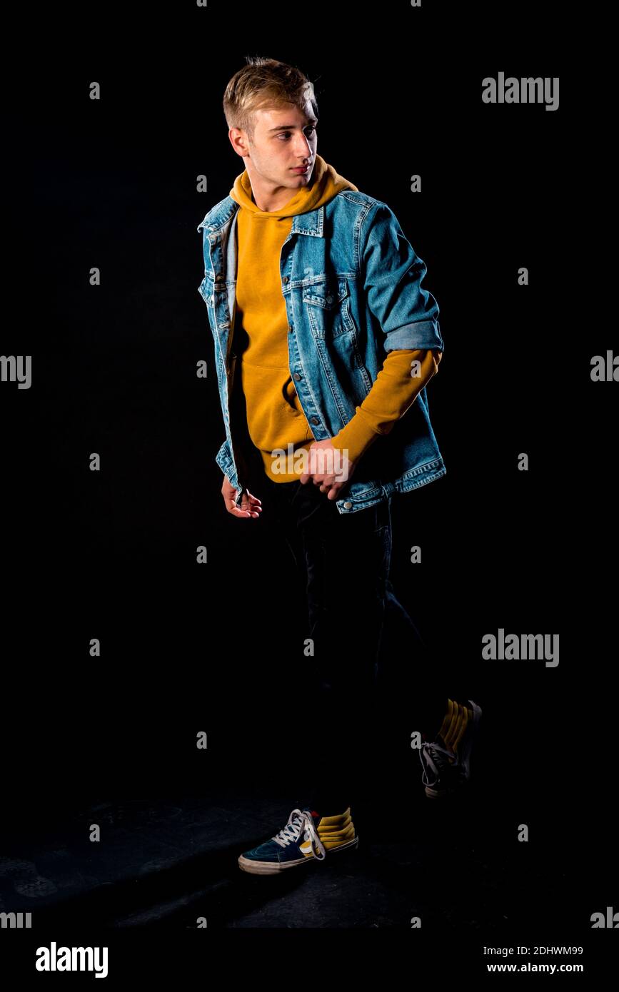 Portrait of a handsome male model posing in cool fashionable clothing ...