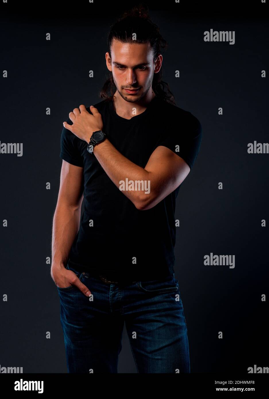 Portrait of a handsome male model posing in cool fashionable clothing ...