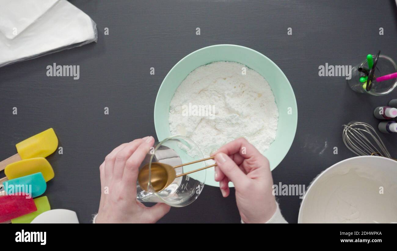 Step by step. Flat lay. Preparing simple royal icing to decorate sugar ...