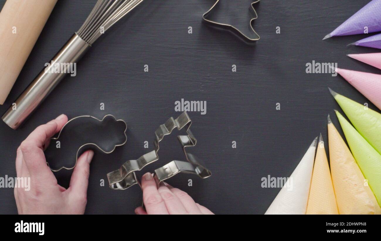 Step by step. Flat lay. Piping bags with colorful royal icing on a ...