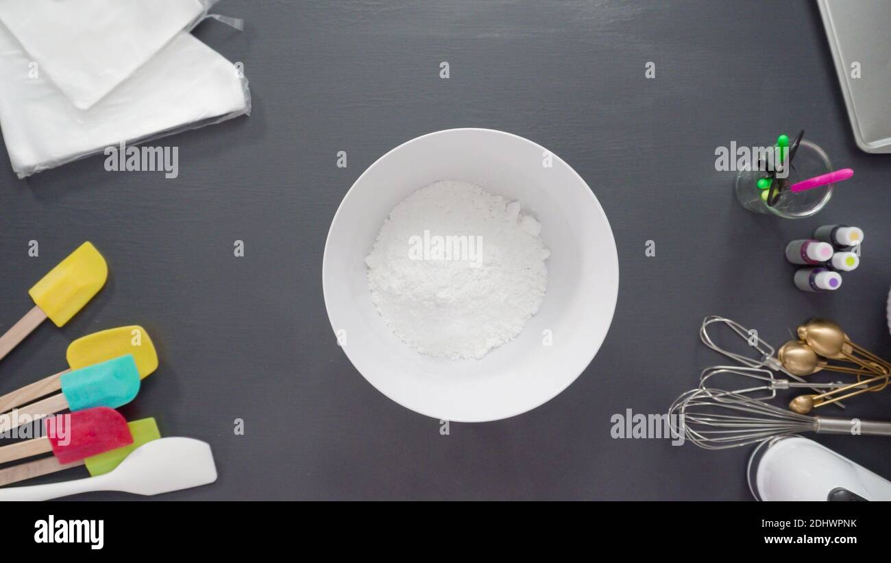 Step by step. Flat lay. Preparing simple royal icing to decorate sugar ...