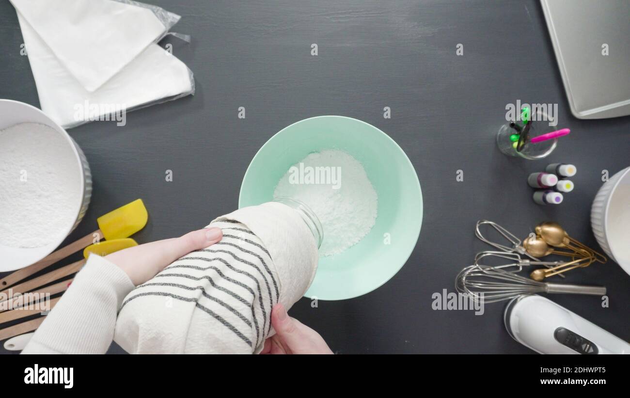 Step by step. Flat lay. Preparing simple royal icing to decorate sugar ...