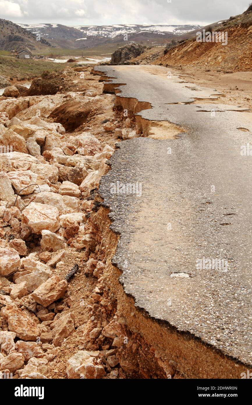 Damaged mountain asphalt road. Country road Stock Photo - Alamy