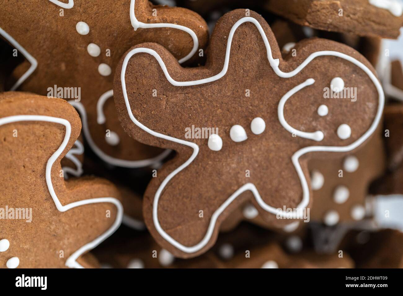 Gingerbread cookies decorated with white royal icing Stock Photo - Alamy