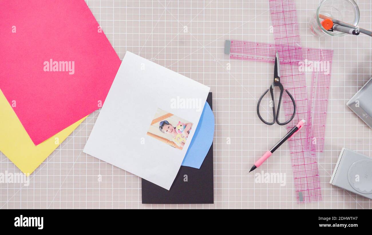Flat lay. Little girl making a handmade Father's Day card from ...