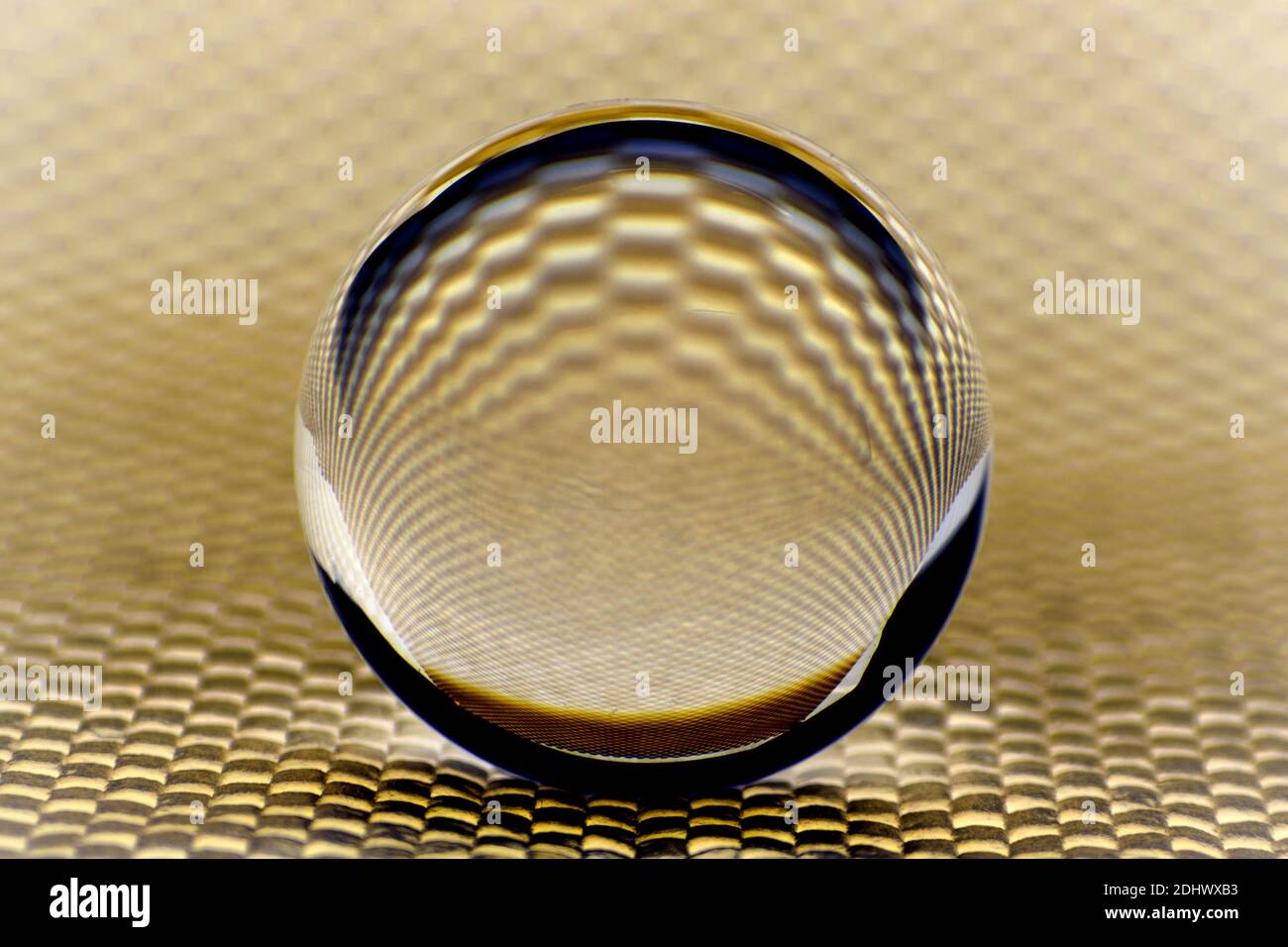 A glass ball in abstract brown color in blur Stock Photo - Alamy
