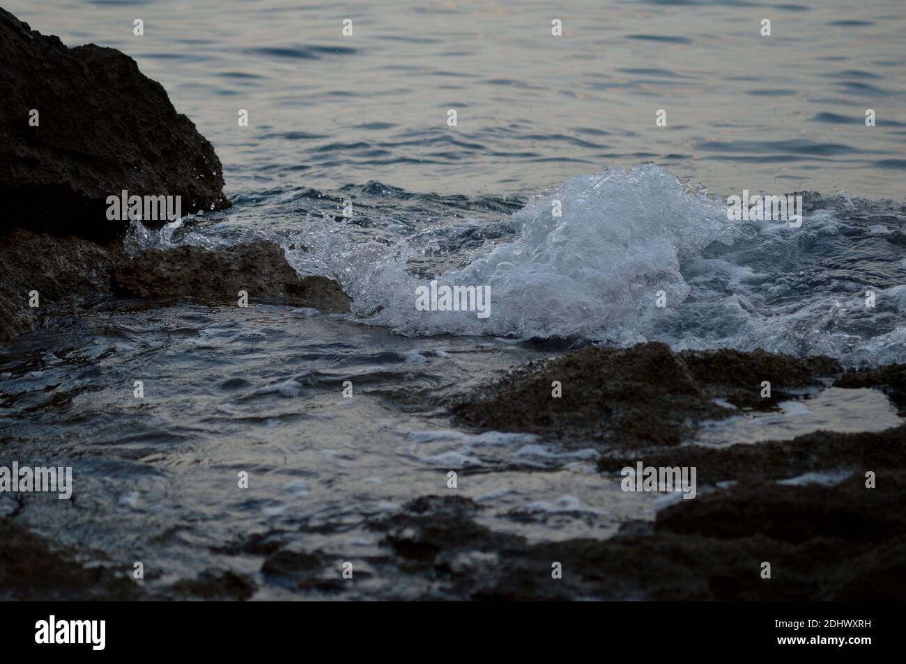 Sea waves crashing into rocks. Storm at the sea, dark, moody photo ...