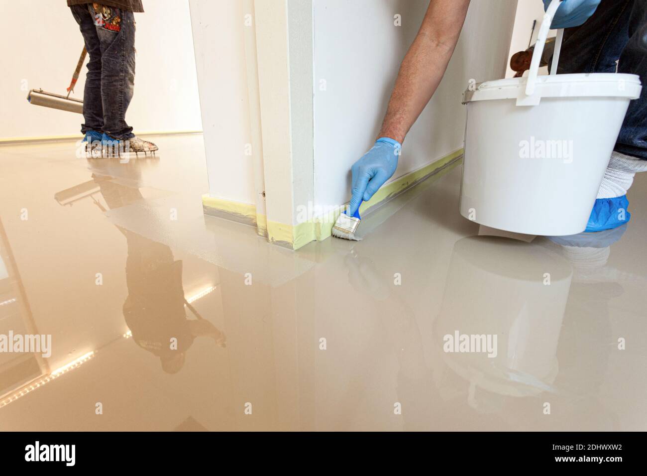 Applying layers hi-res stock photography and images - Alamy