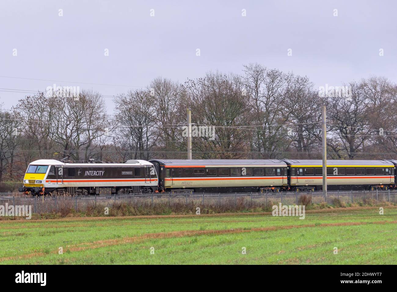 Former BR Class 90 90002 in BR Inter-City Livery seen at Winwick on the ...