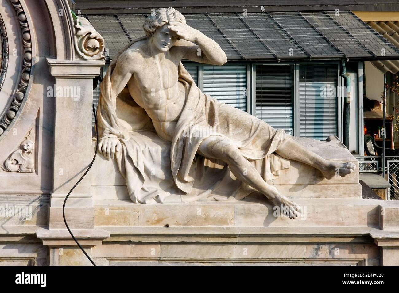 Man stone statue milan hi-res stock photography and images - Alamy