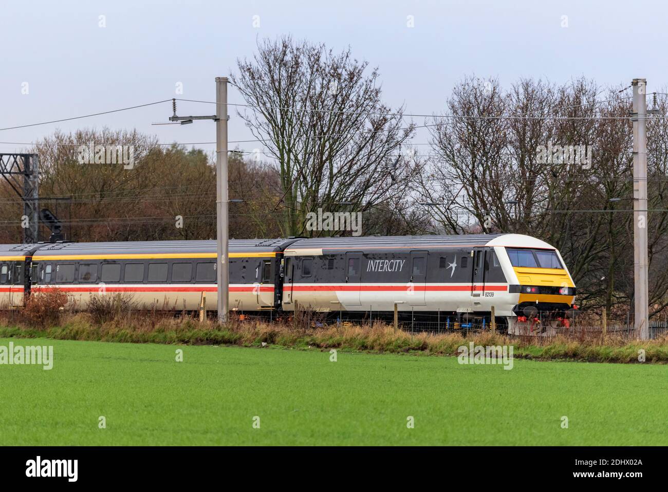 Former BR Class 90 90002 in BR Inter-City Livery seen at Winwick on the ...