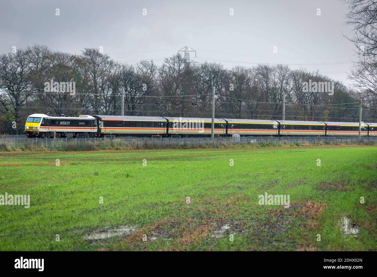 Former BR Class 90 90002 in BR Inter-City Livery seen at Winwick on the ...
