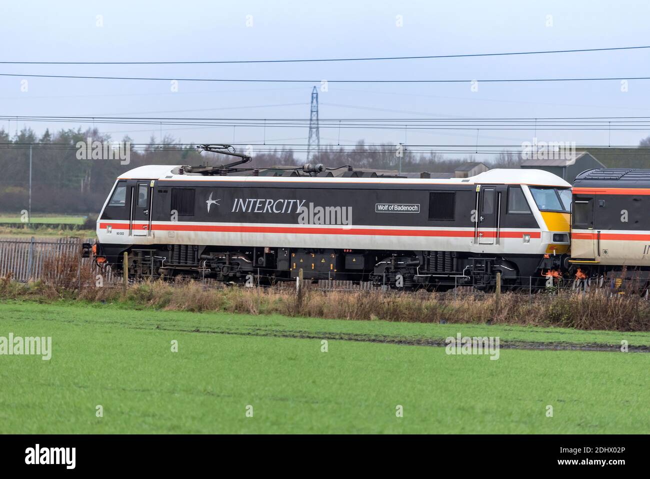 Former BR Class 90 90002 in BR Inter-City Livery seen at Winwick on the ...