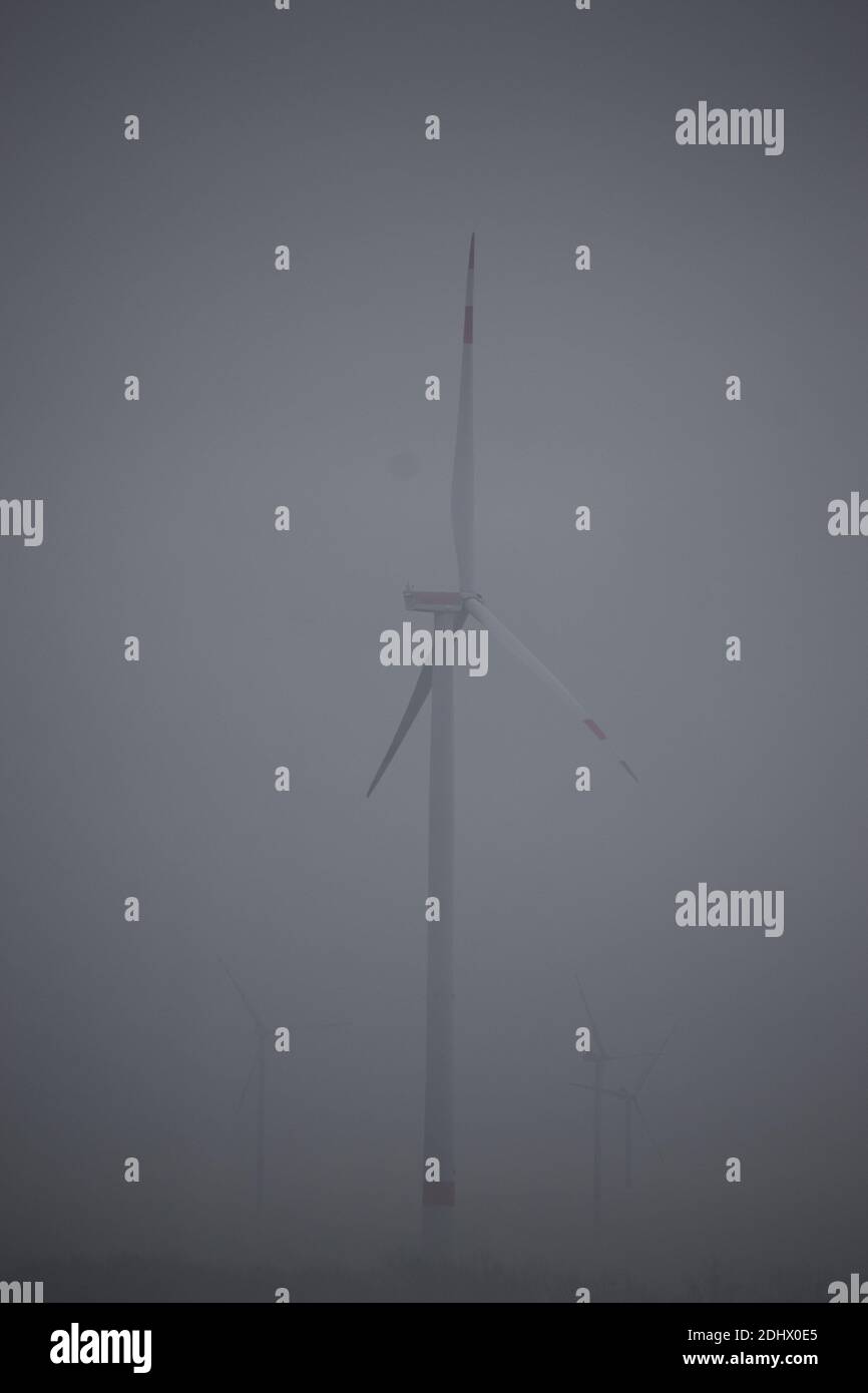wind energy in the fog Stock Photo - Alamy