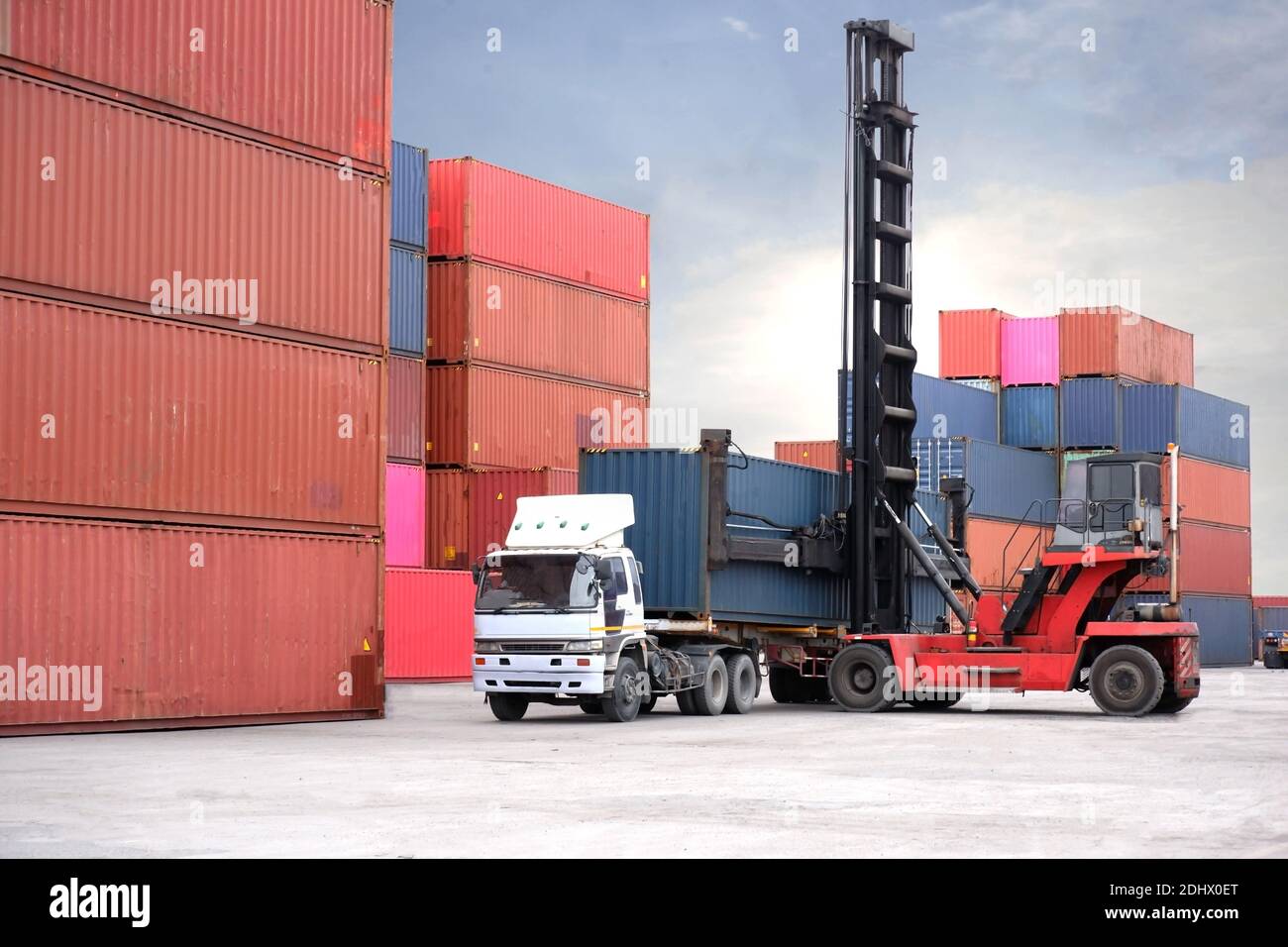 Forklift unloading container boxes loading for import-export logistics ...