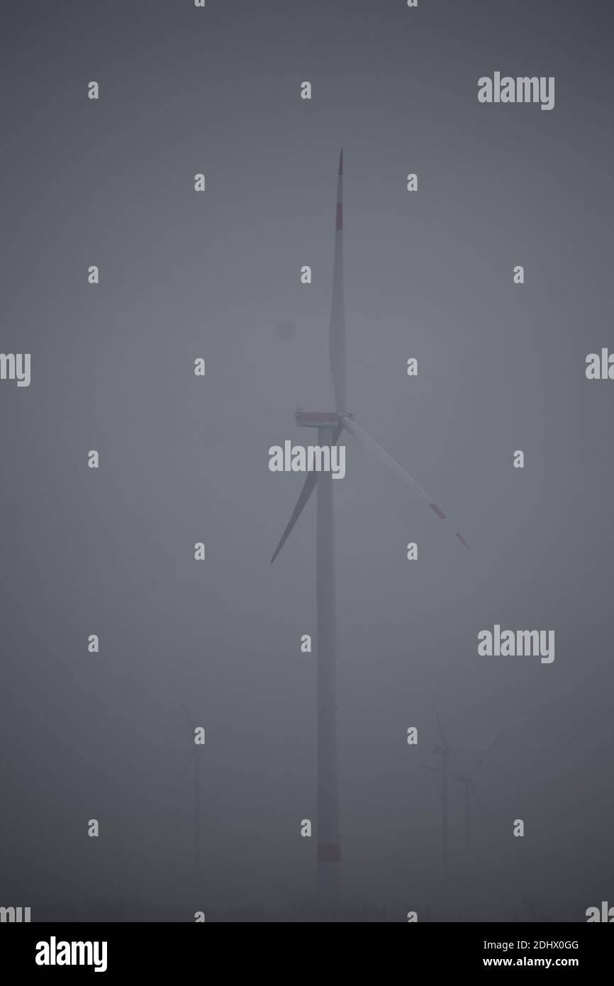 wind energy in the fog Stock Photo - Alamy
