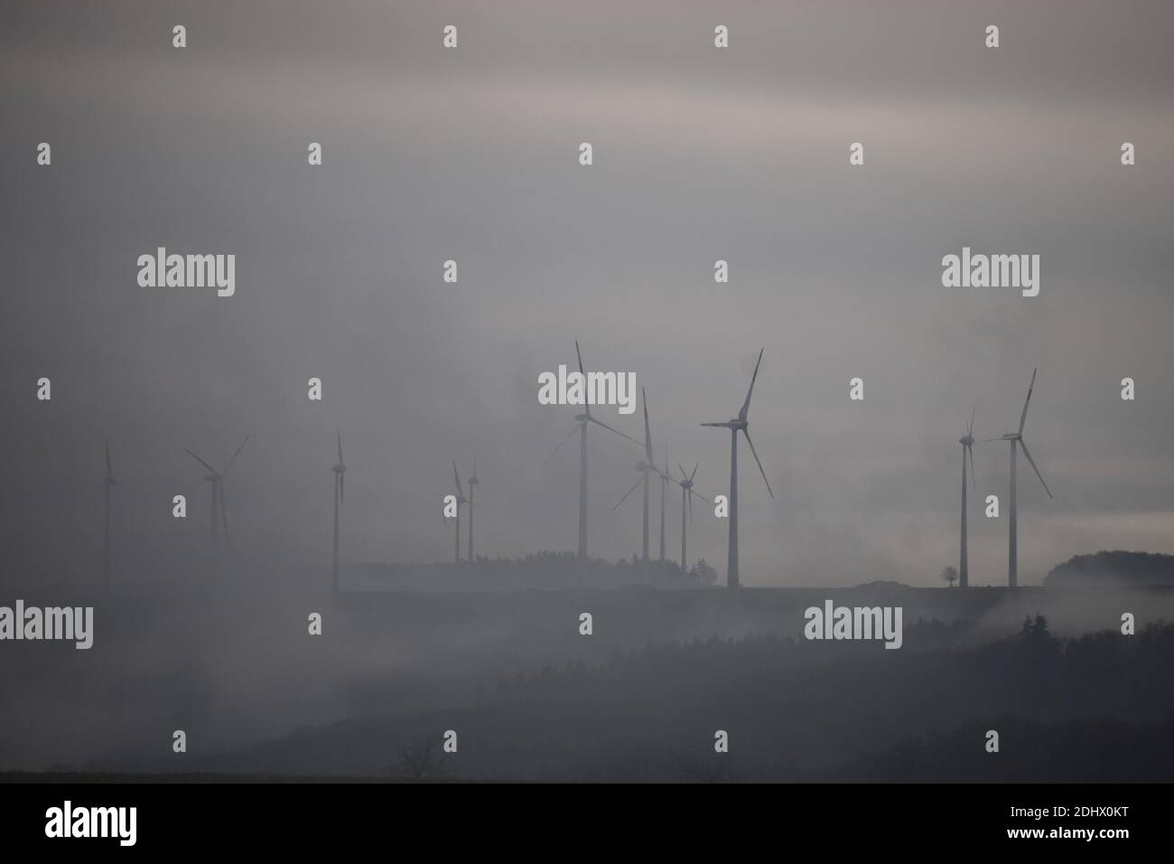 wind energy in the fog Stock Photo - Alamy