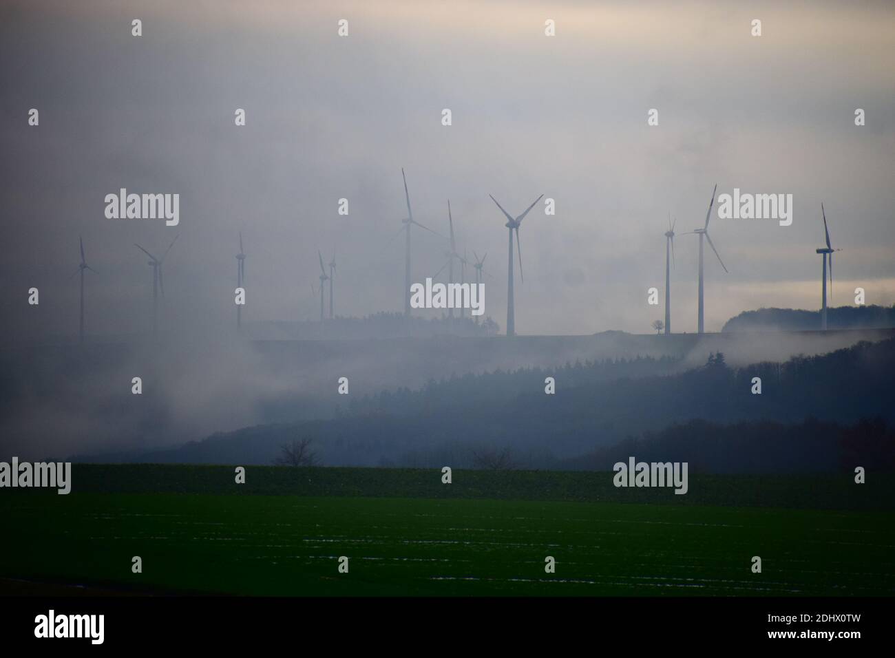 wind energy in the fog Stock Photo - Alamy