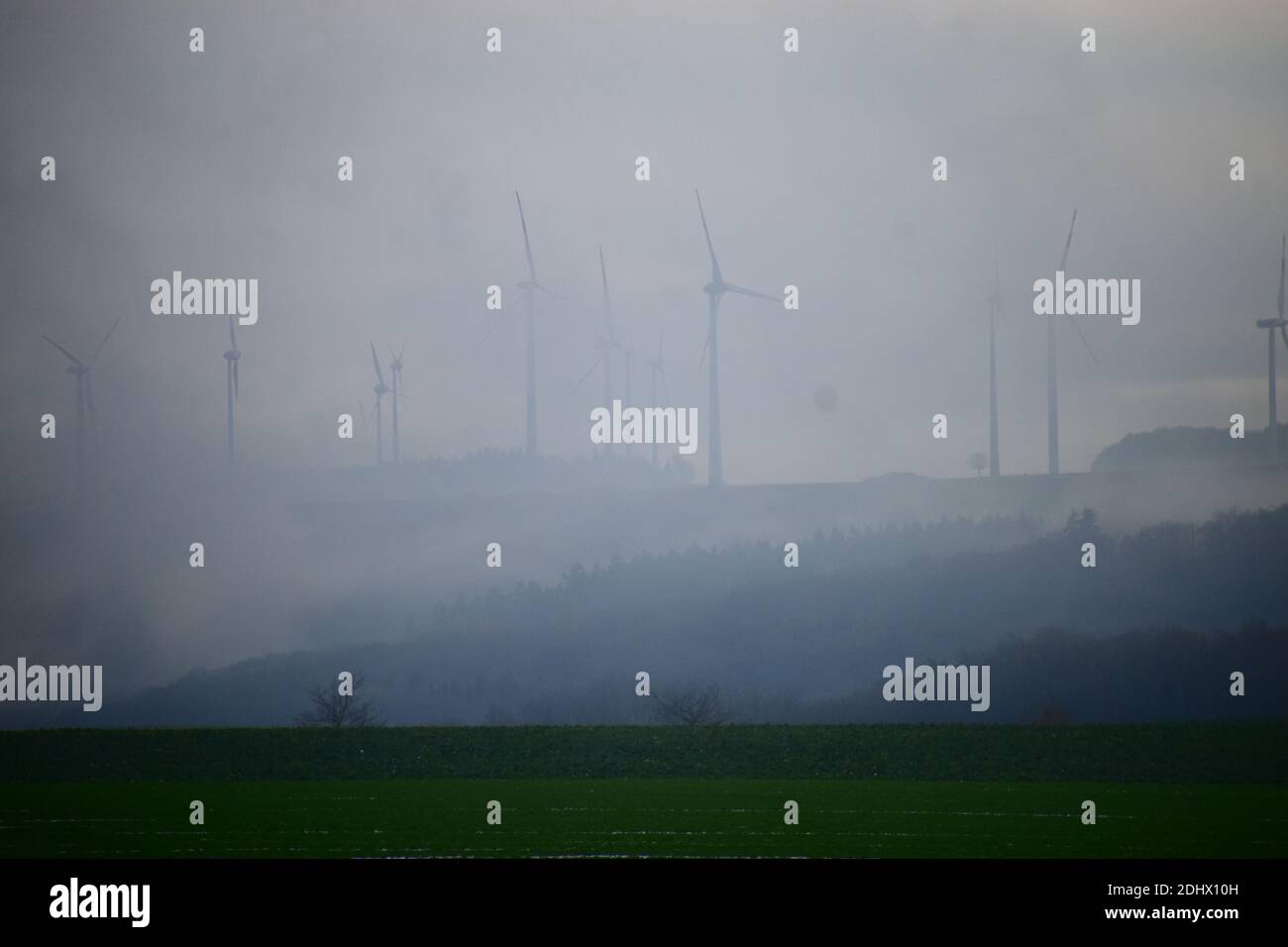 wind energy in the fog Stock Photo - Alamy