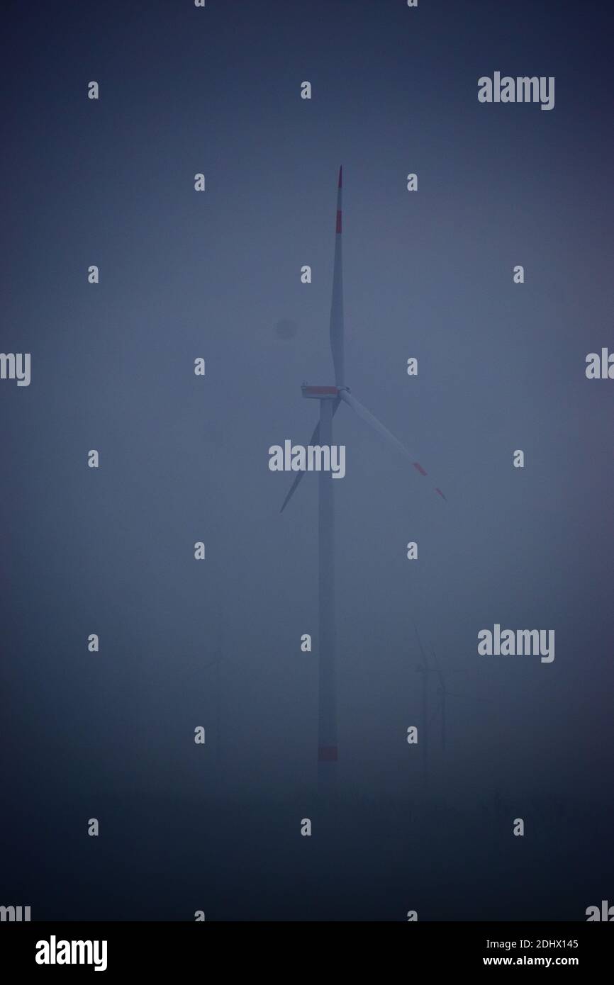 wind energy in the fog Stock Photo - Alamy