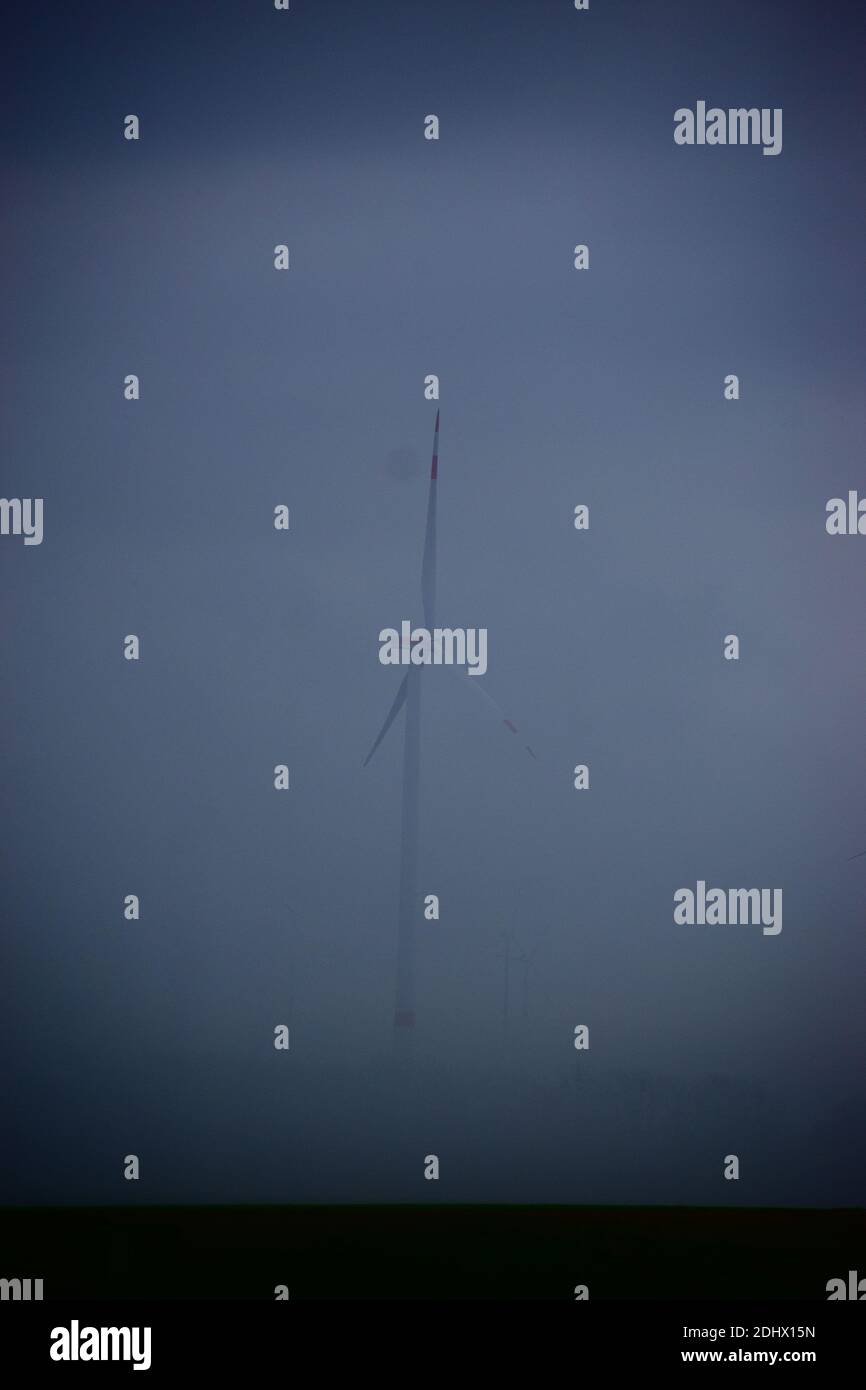 wind energy in the fog Stock Photo - Alamy